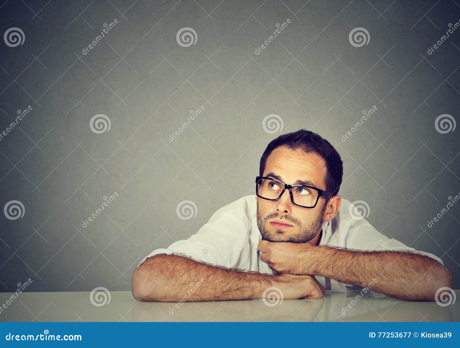 Thinking Young Business Man Sitting at Table Stock Image - Image of ...