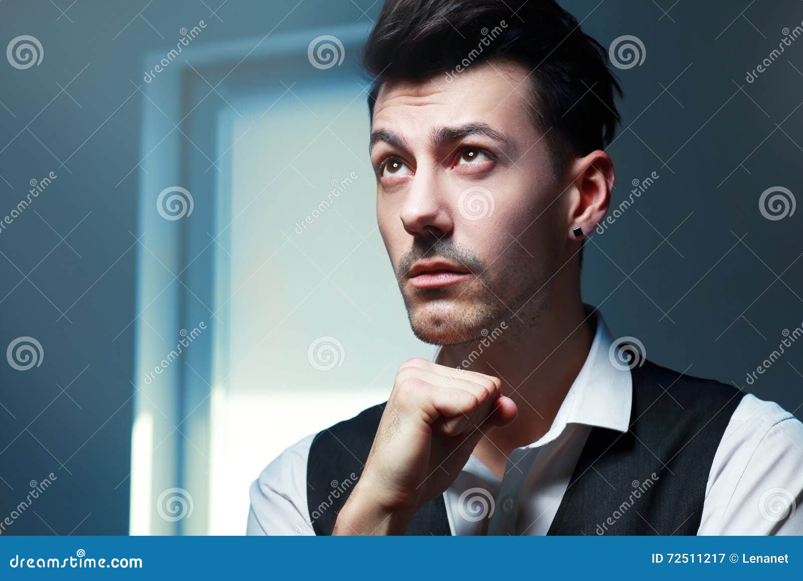 Thinking young man stock image. Image of adult, color - 72511217