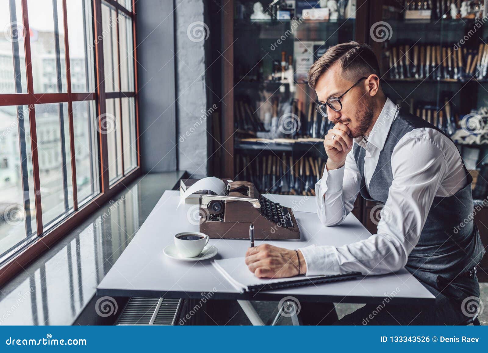 Thinking young man at work stock photo. Image of professional - 133343526
