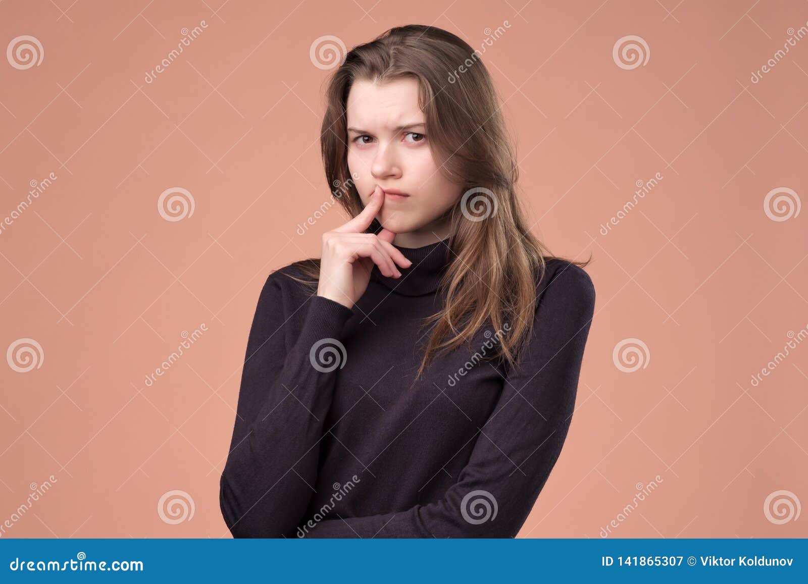 Thinking Young Woman Trying To Make a Right Decision. Stock Image ...