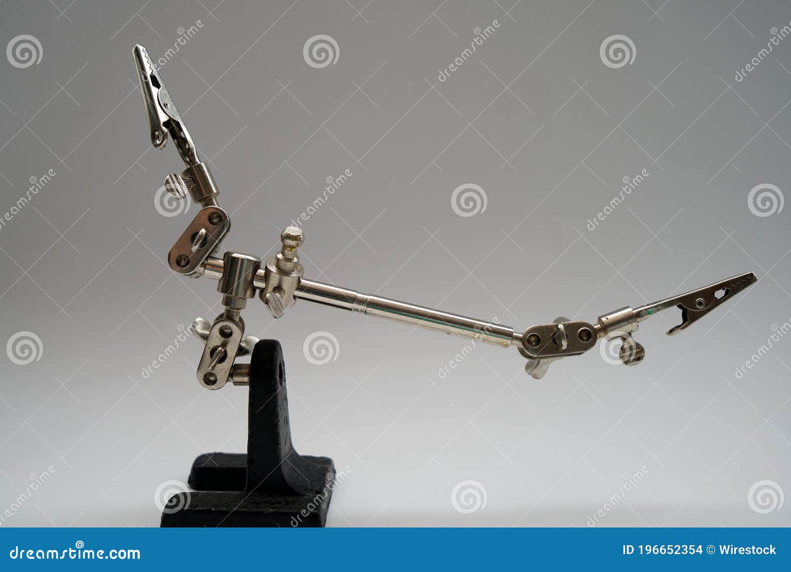Third Hand Tool on a Gray Background Stock Photo - Image of control ...