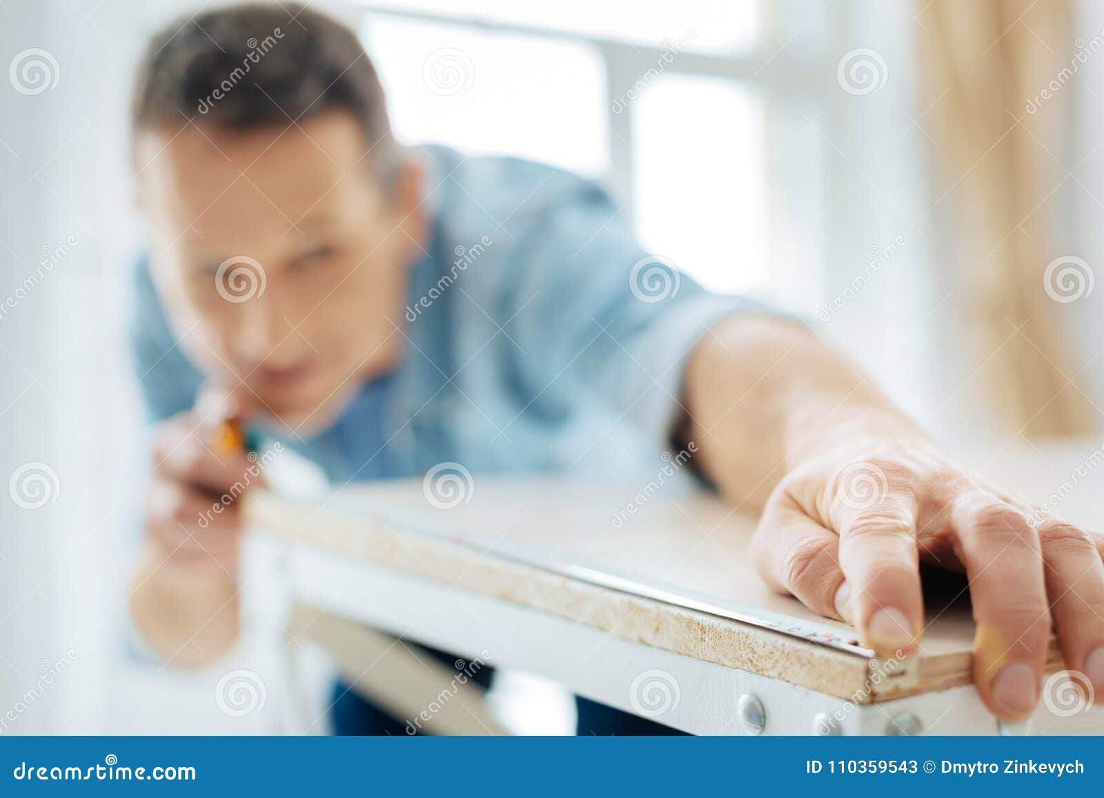 Close Up of Young Man Using a Tape Measure Stock Image - Image of ...