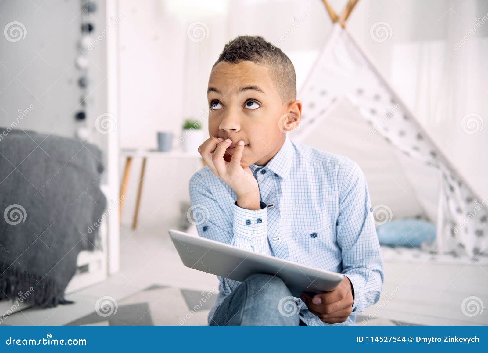 Thoughtful Adorable Boy Deciding on Learning Program Stock Photo ...