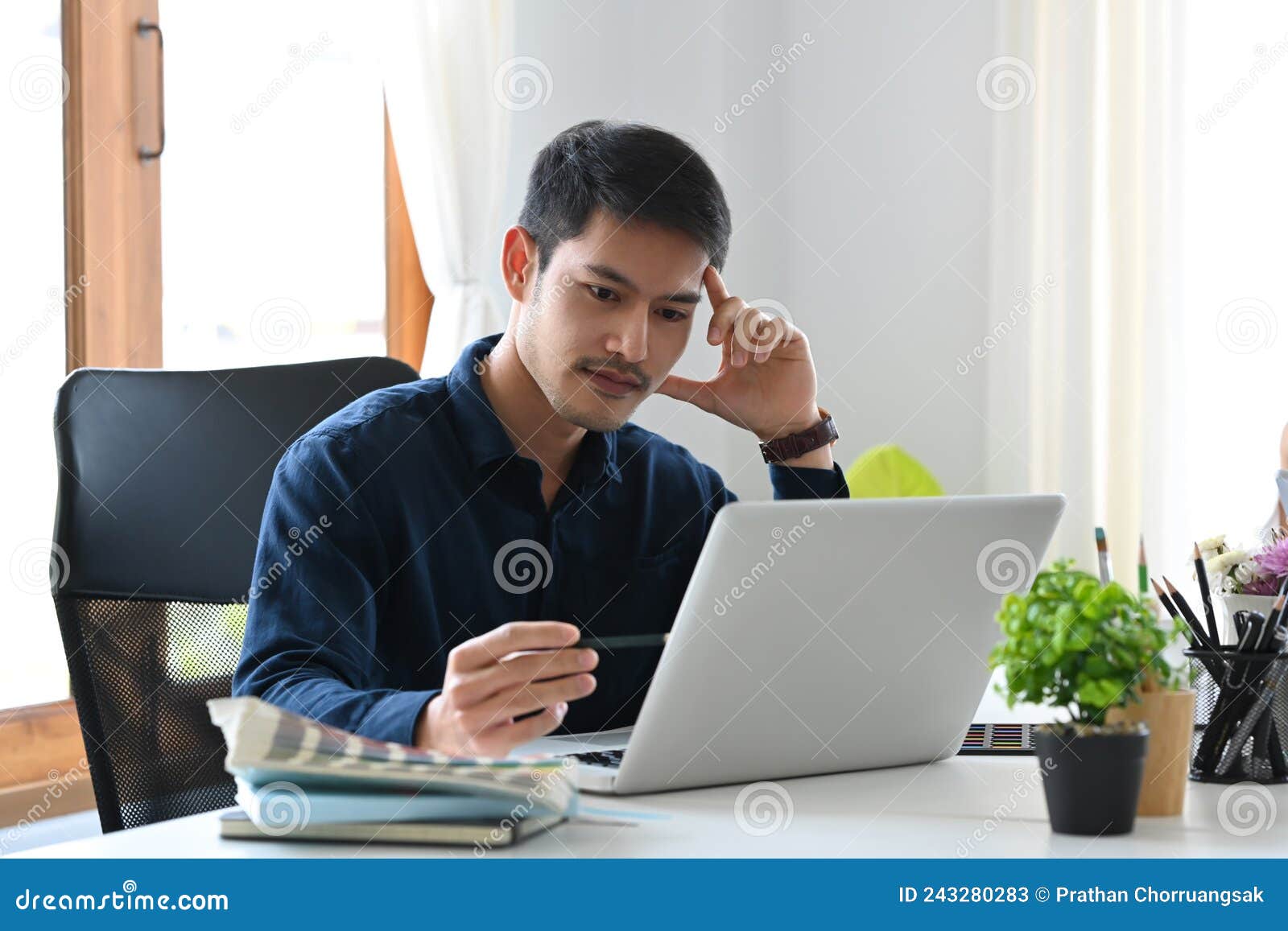 Thoughtful Man Designer Working with Computer Laptop at Creative Office ...