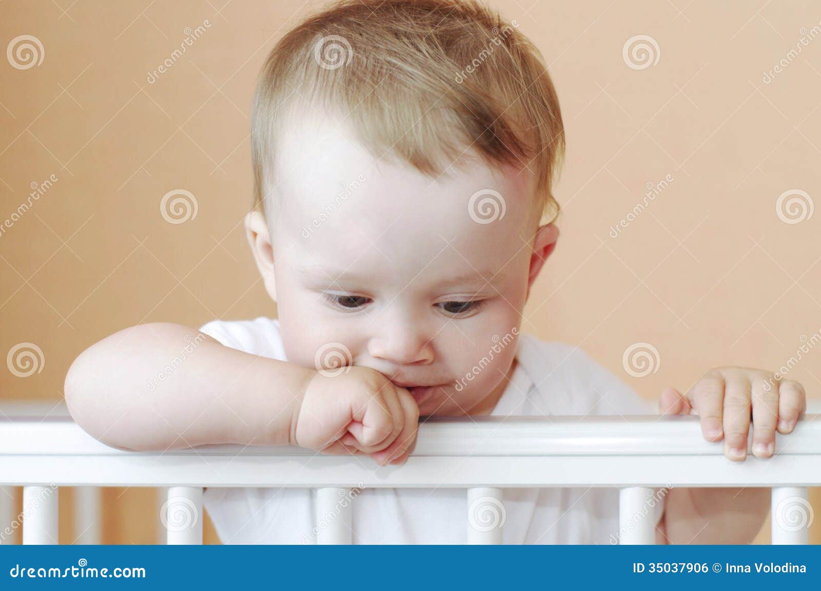 Thoughtful Baby in White Bed Stock Photo - Image of european, white ...