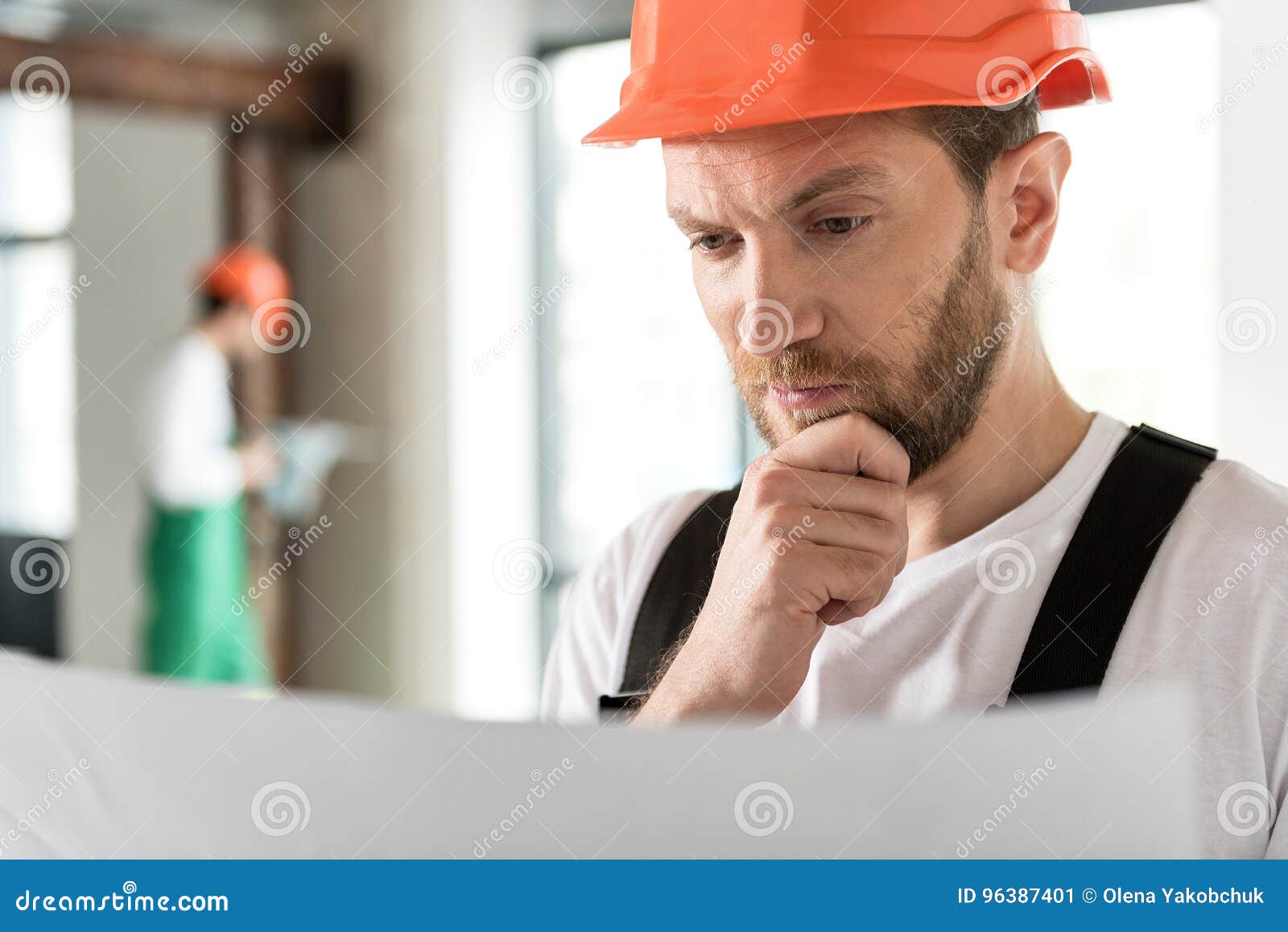 Thoughtful Bearded Builder Looking at Draft Stock Image - Image of male ...