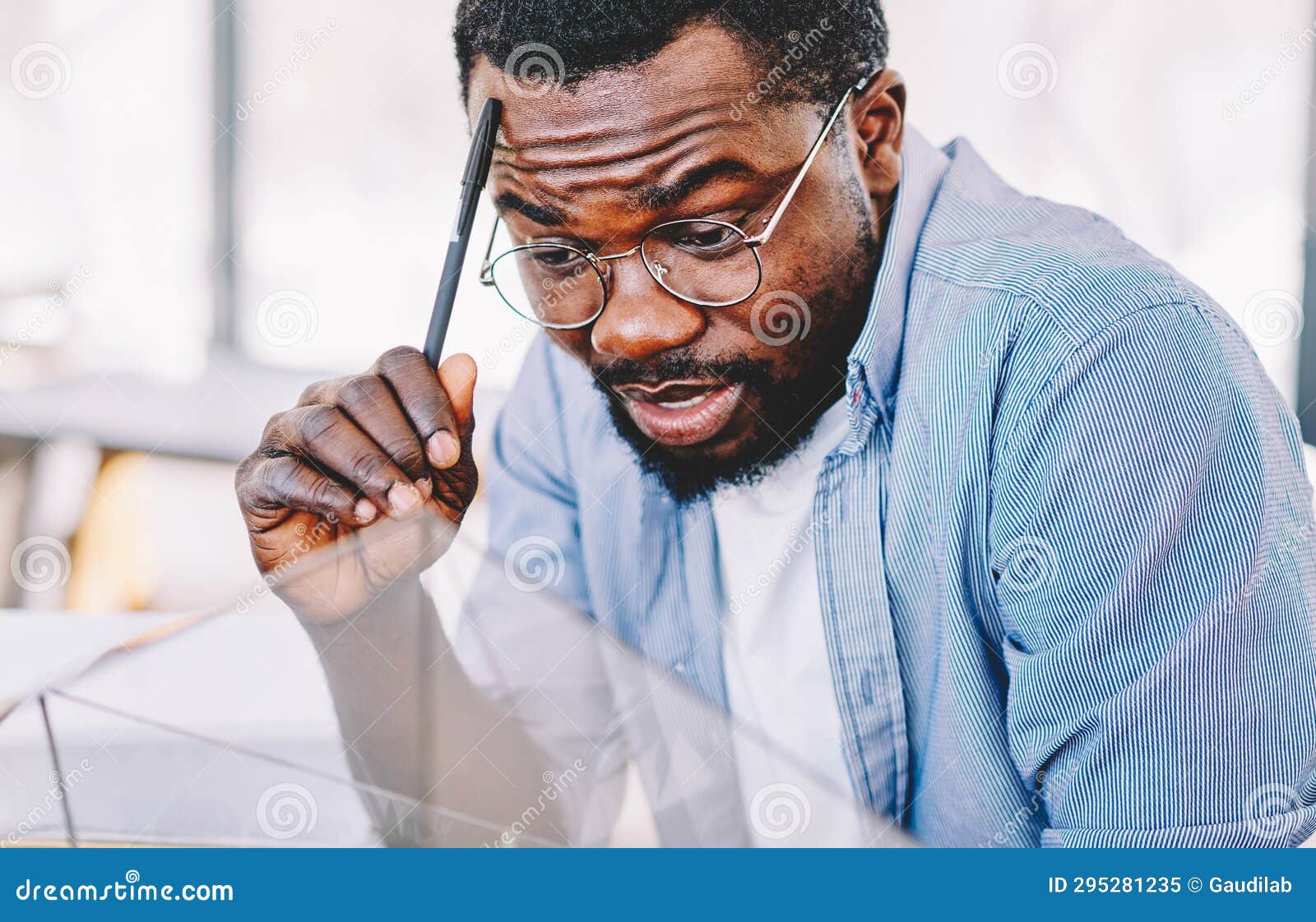 Thoughtful Black Man Staring at Glass Terrarium in Office Stock Image ...