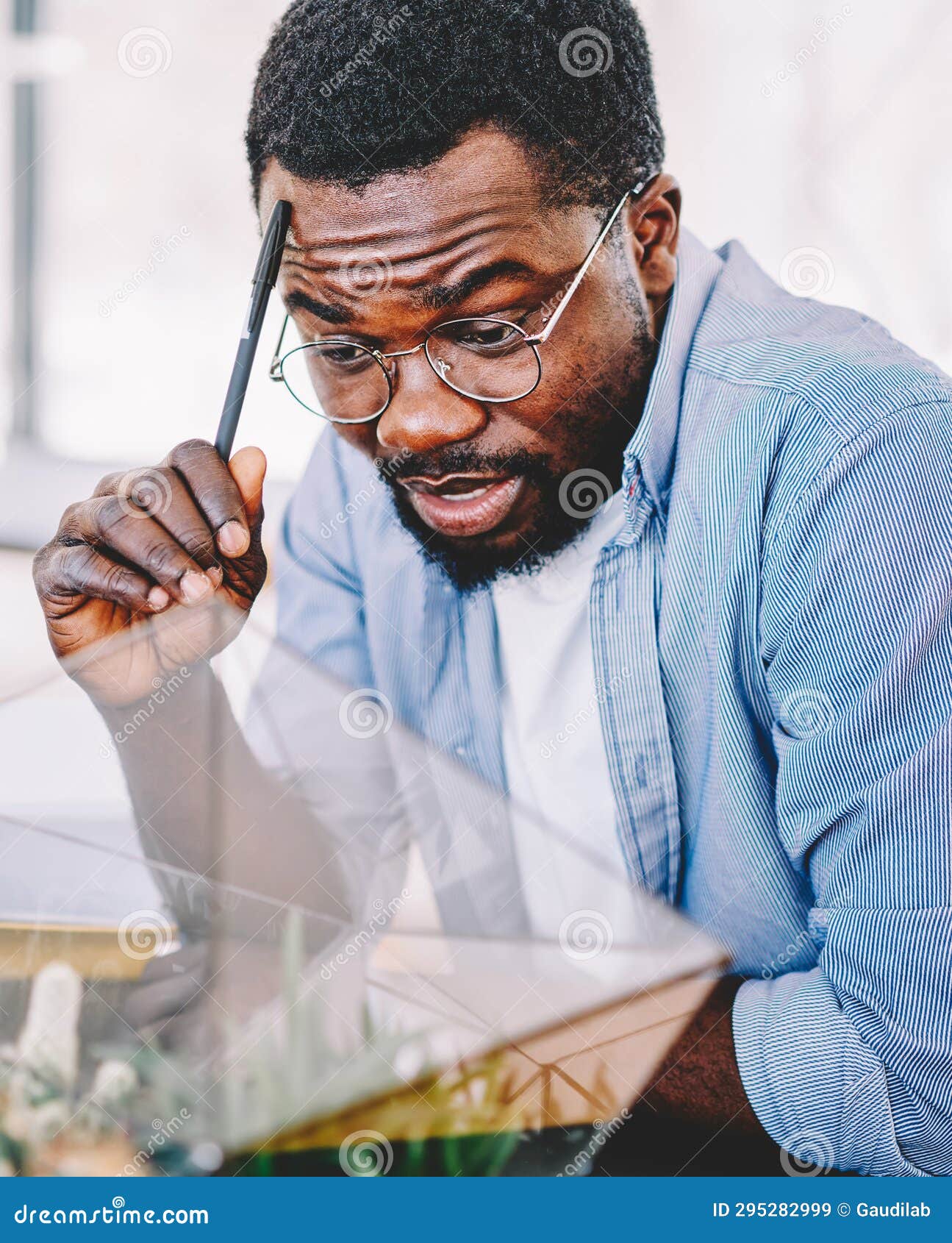 Thoughtful Black Man Staring at Glass Terrarium in Office Stock Image ...