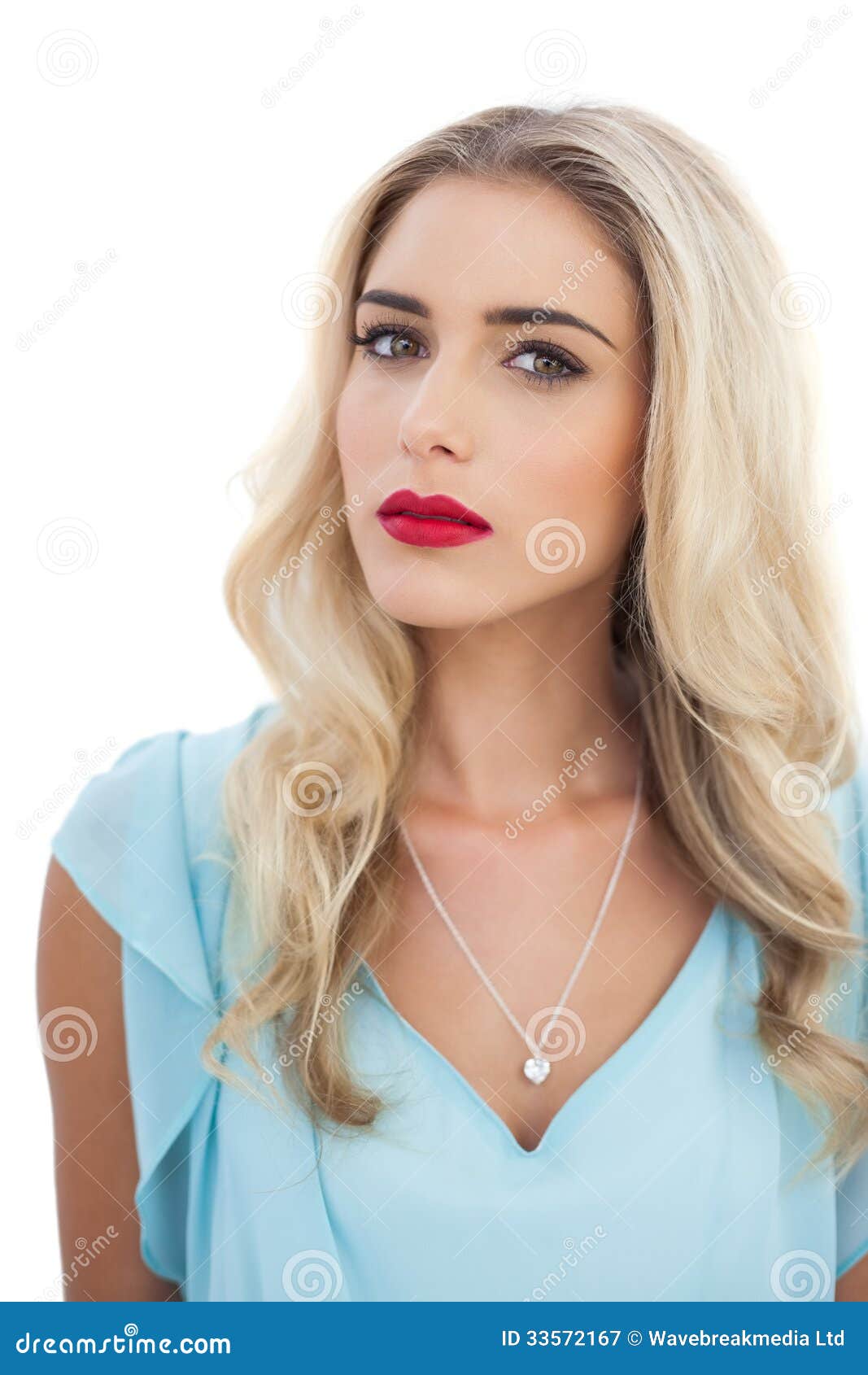 Thoughtful Blonde Model in Blue Dress Looking at Camera Stock Image ...