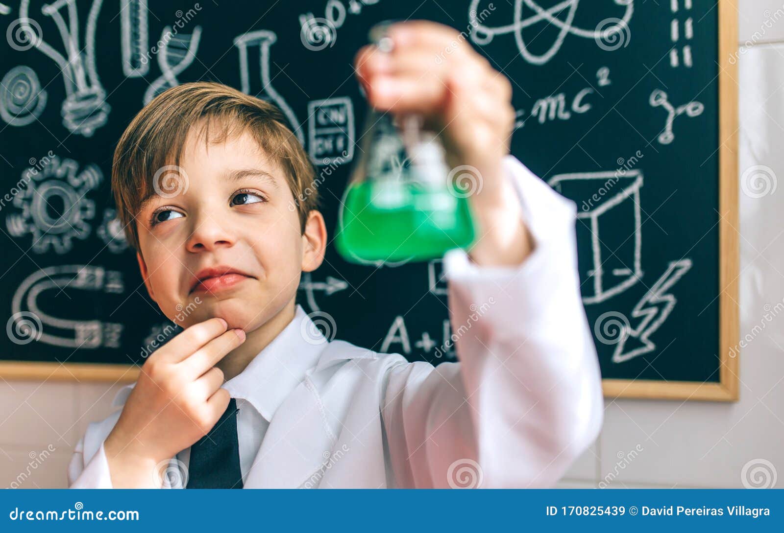 Thoughtful Boy Dressed As Chemist with Flask Stock Image - Image of ...