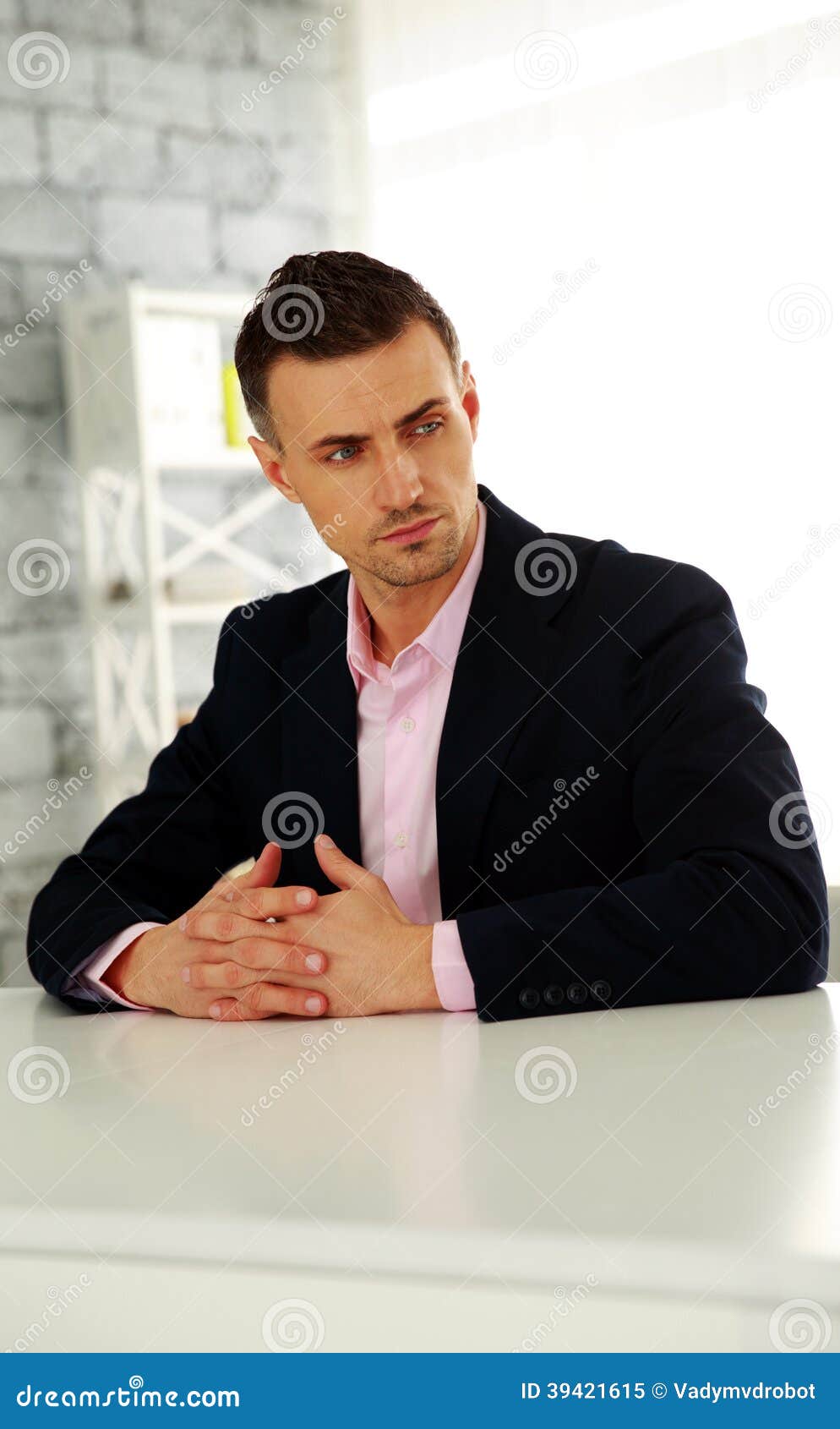 Thoughtful Businessman Sitting at the Table Stock Image - Image of desk ...