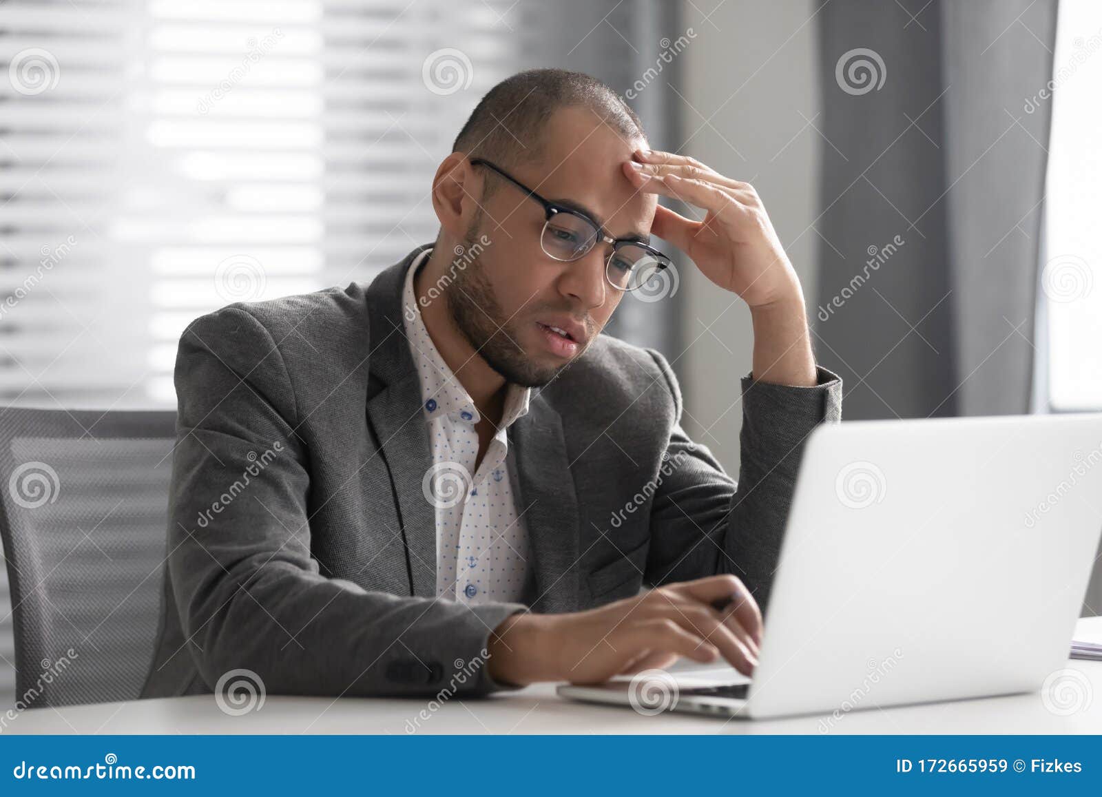 Thoughtful Businessman Using Laptop Pondering Over Problem Solving ...