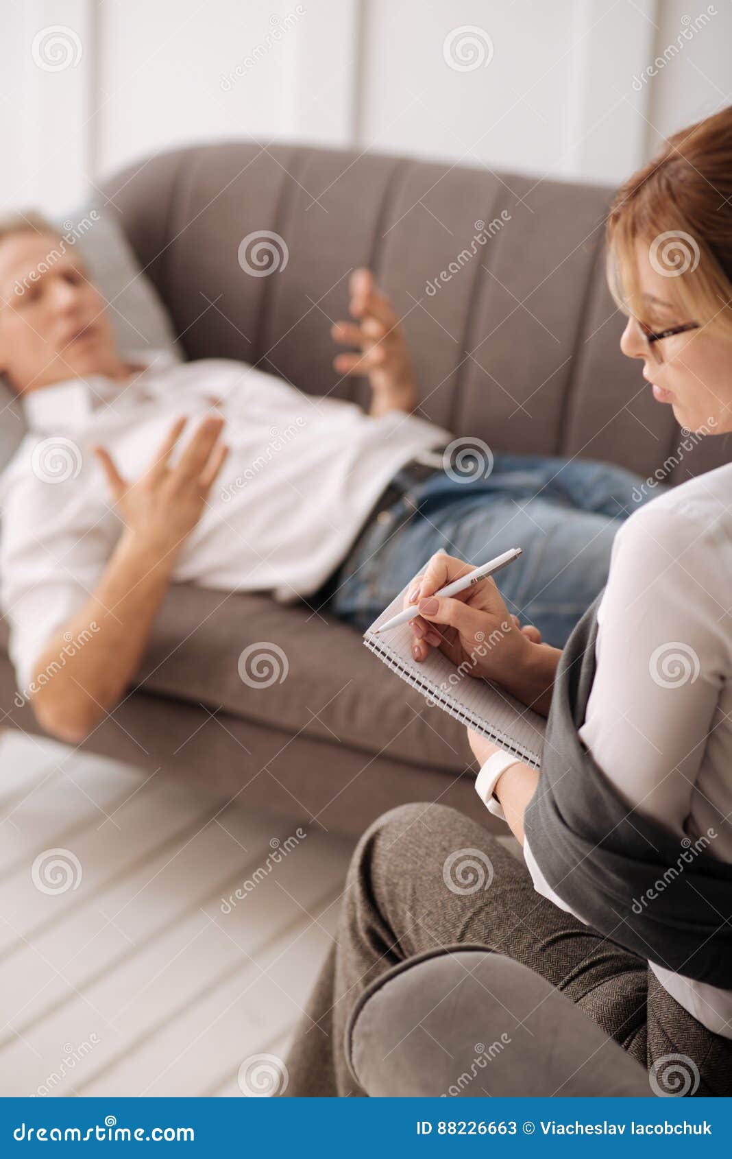 Thoughtful Concentrated Therapist Taking Notes Stock Image - Image of ...