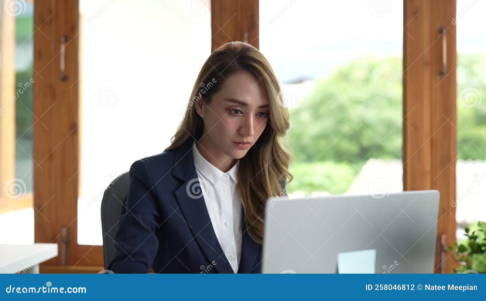 Thoughtful Concerned Asian Woman Working on Laptop Computer Thinking ...
