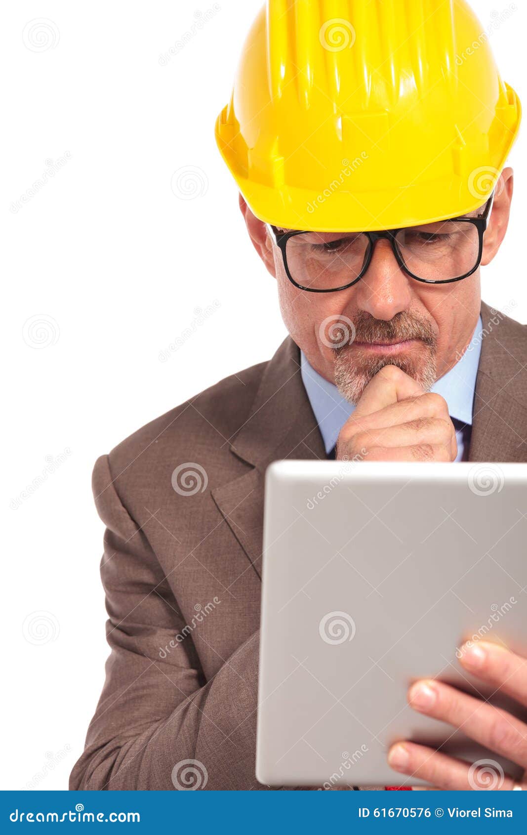Thoughtful Construction Engineer Reading on His Tablet Pad Stock Photo ...