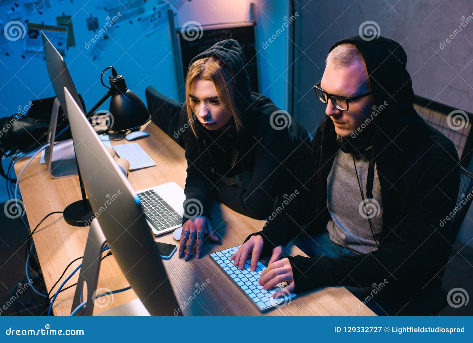 Thoughtful Couple of Hackers Working Stock Image - Image of internet ...