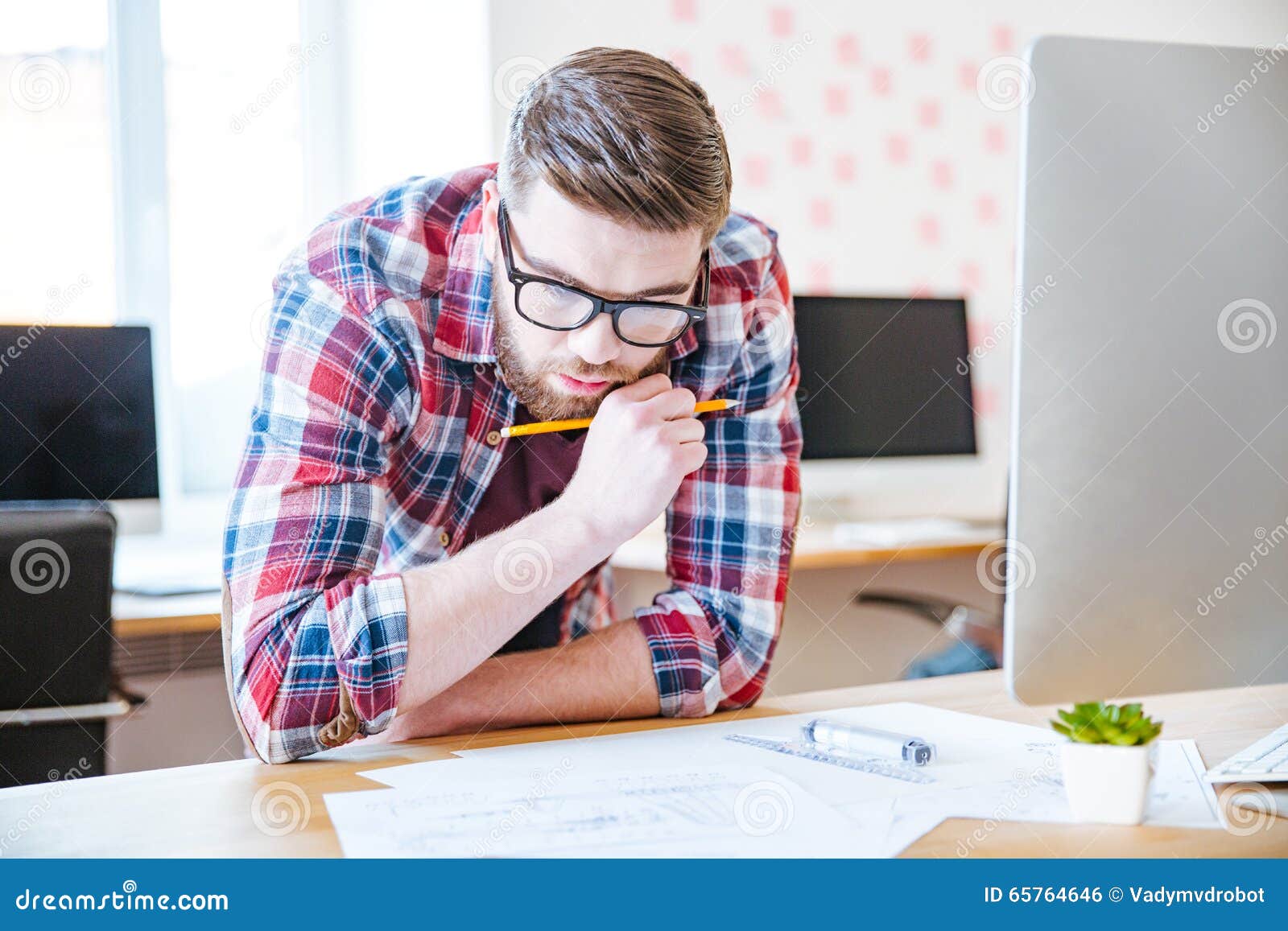 Thoughtful Creative Man Designing Project and Making Blueprint Stock ...