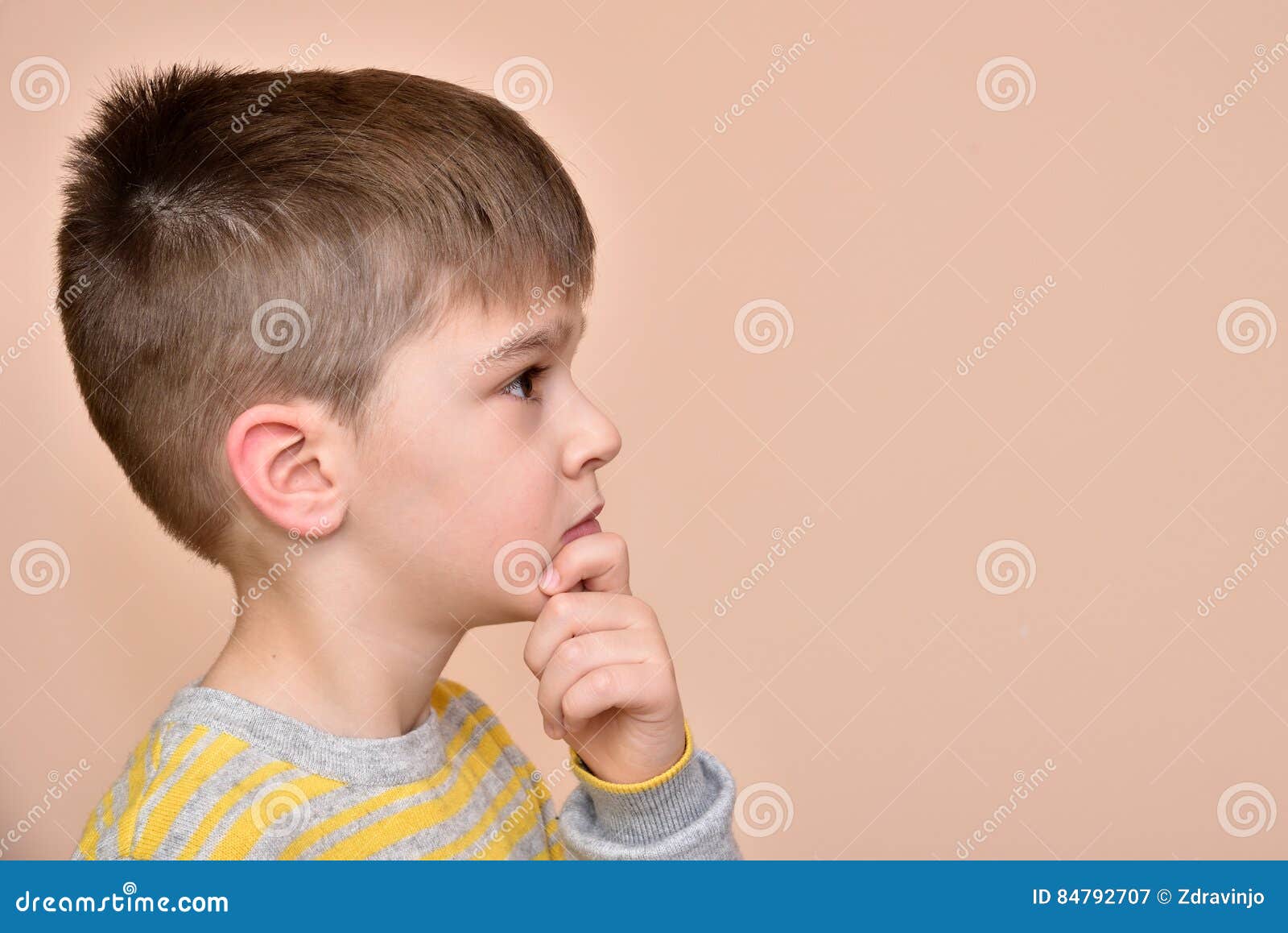 Thoughtful cute young boy stock image. Image of knowledge - 84792707