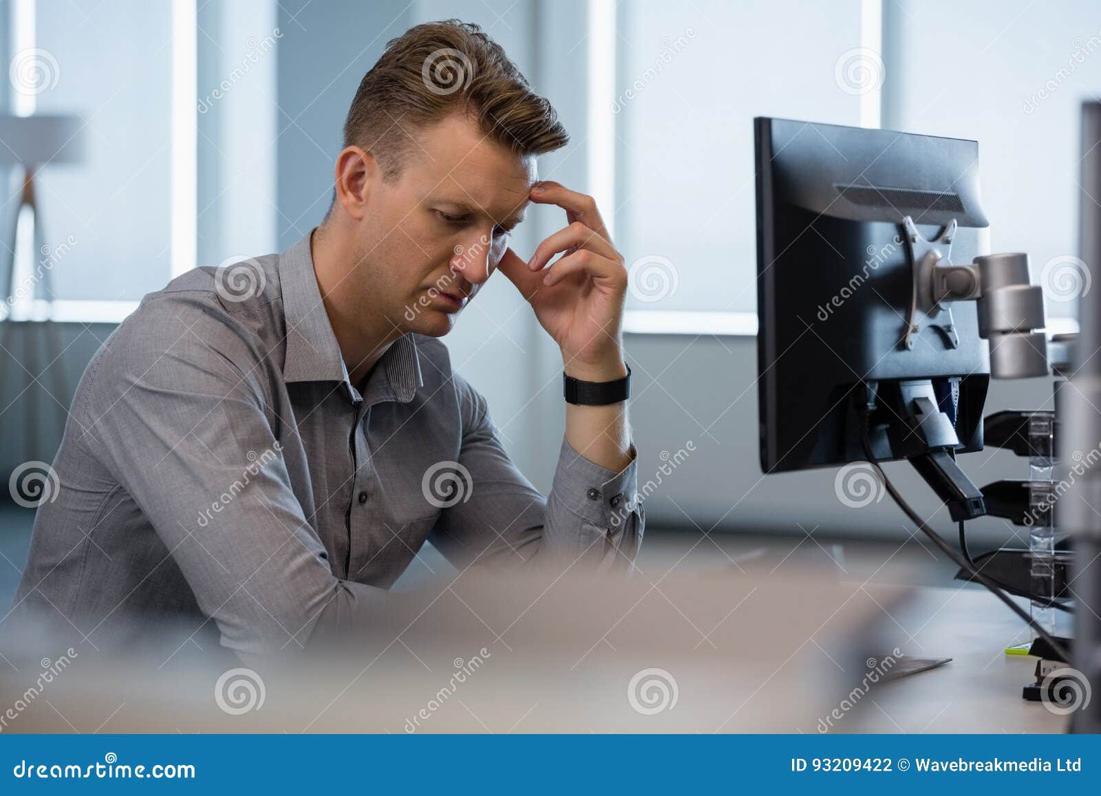 Thoughtful Executive Working at Desk Stock Photo - Image of expertise ...