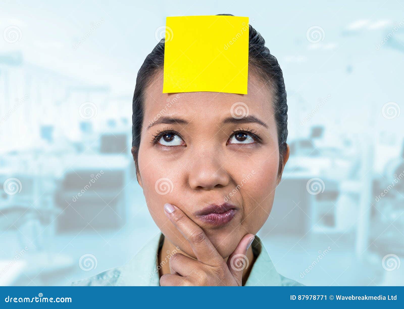 Thoughtful Female Executive with Sticky Note on Head in Office Stock ...