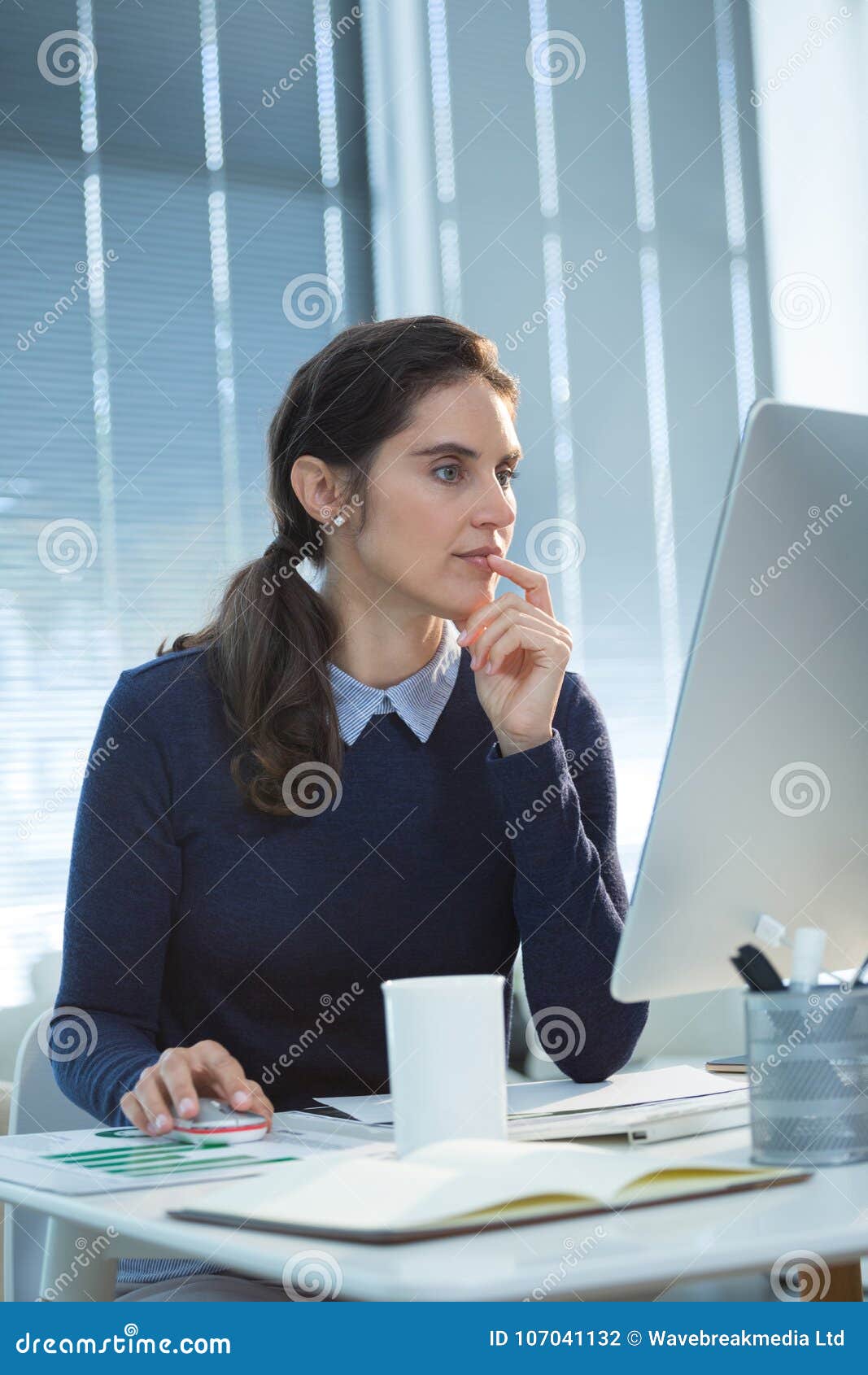 Thoughtful Female Executive Working on Computer Stock Photo - Image of ...