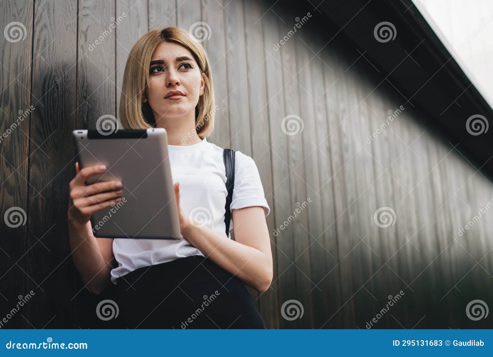 Thoughtful Female Student Using Tablet Outside Stock Image - Image of ...