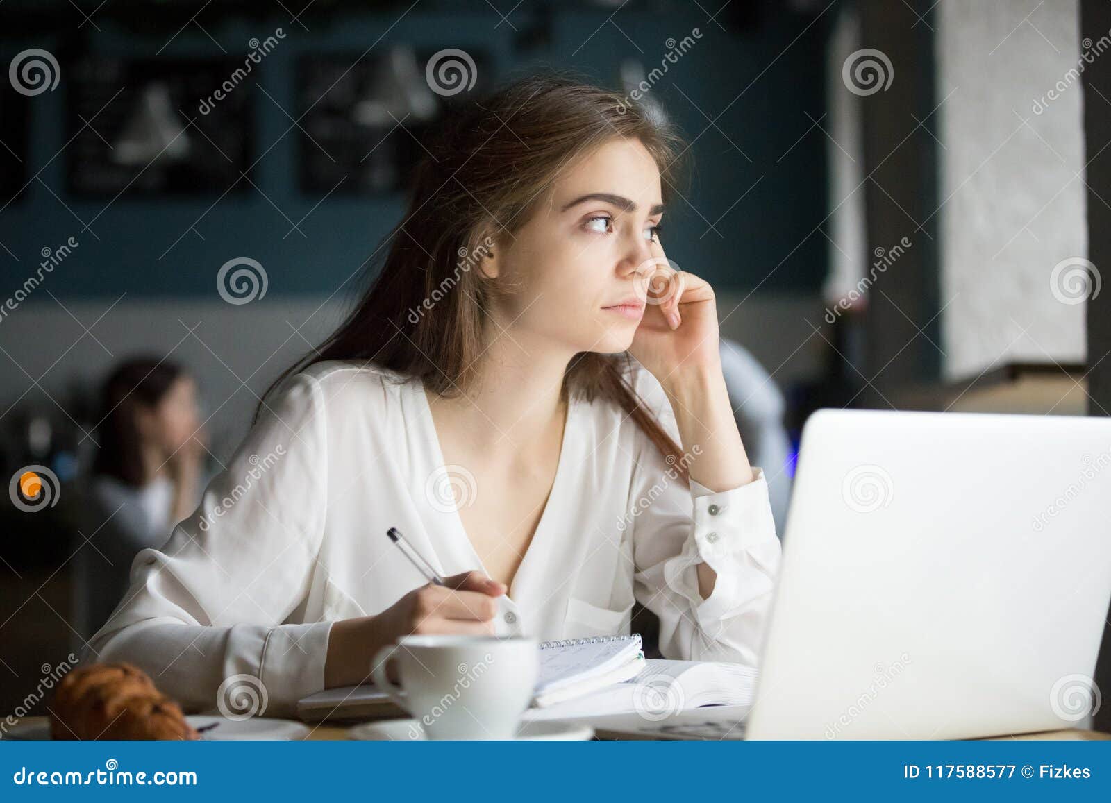 Thoughtful Female Writer or Student Writing Notes in Coffee Shop Stock ...