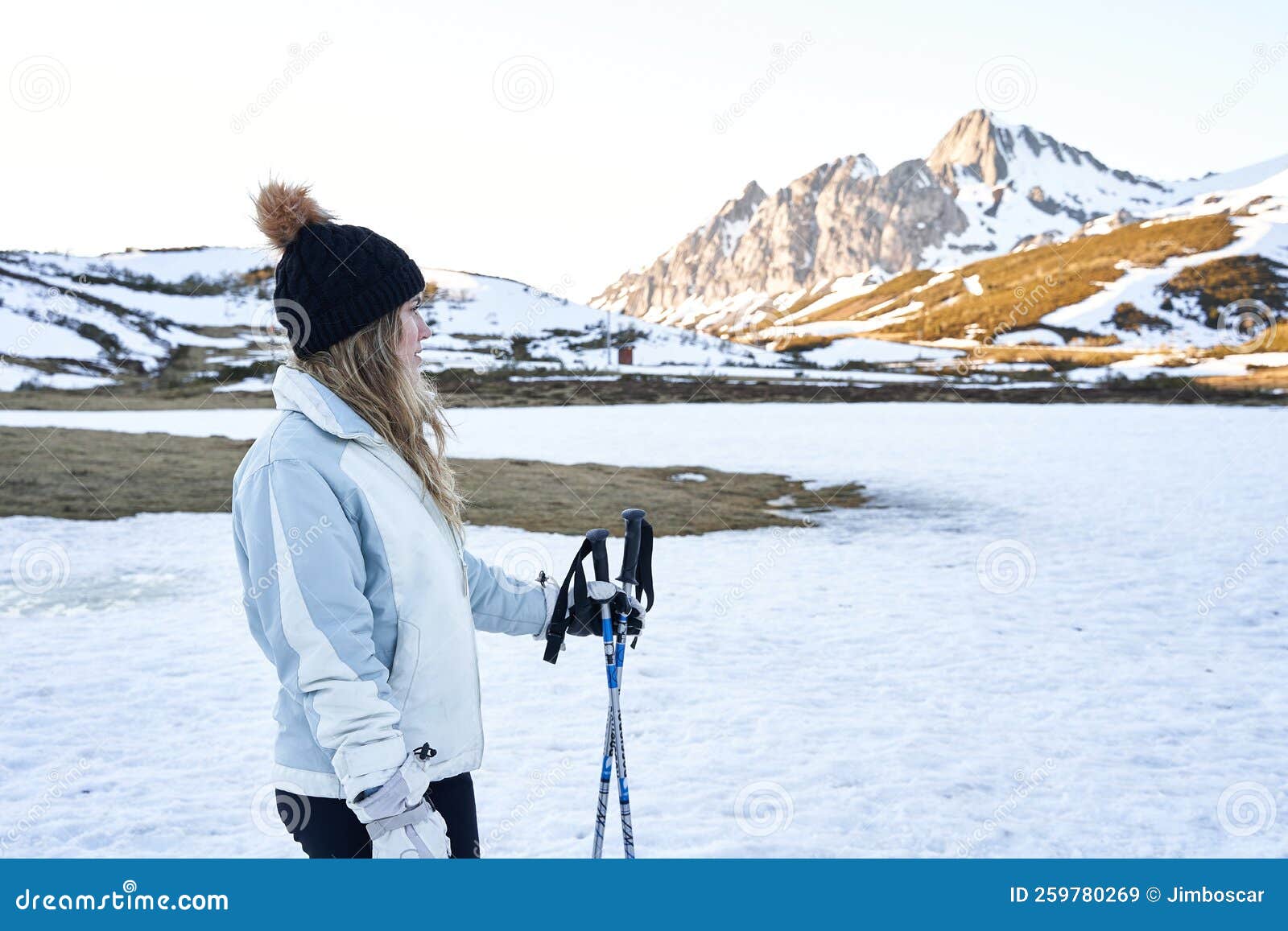 Thoughtful Girl Standing in the Snow Looking at the Landscape Stock ...