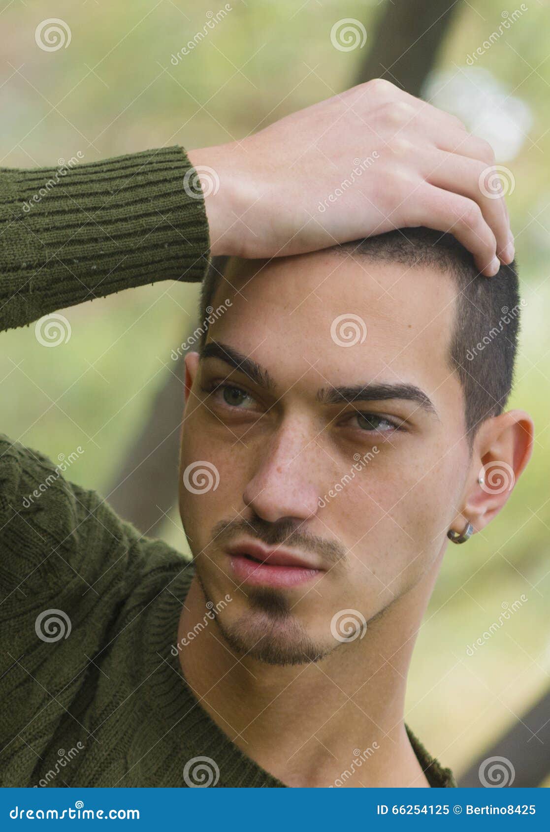 Thoughtful Guy between Trees Stock Image - Image of smile, face: 66254125