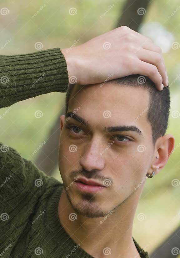 Thoughtful Guy between Trees Stock Image - Image of smile, face: 66254125