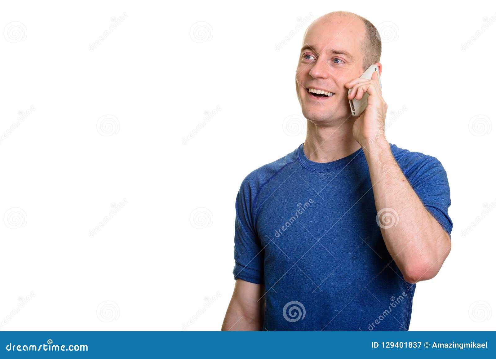 Thoughtful Happy Bald Caucasian Man Smiling And Talking On Mobil Stock