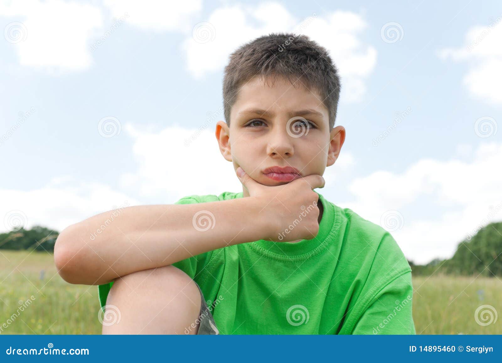 Thoughtful kid outdoor stock photo. Image of think, look - 14895460