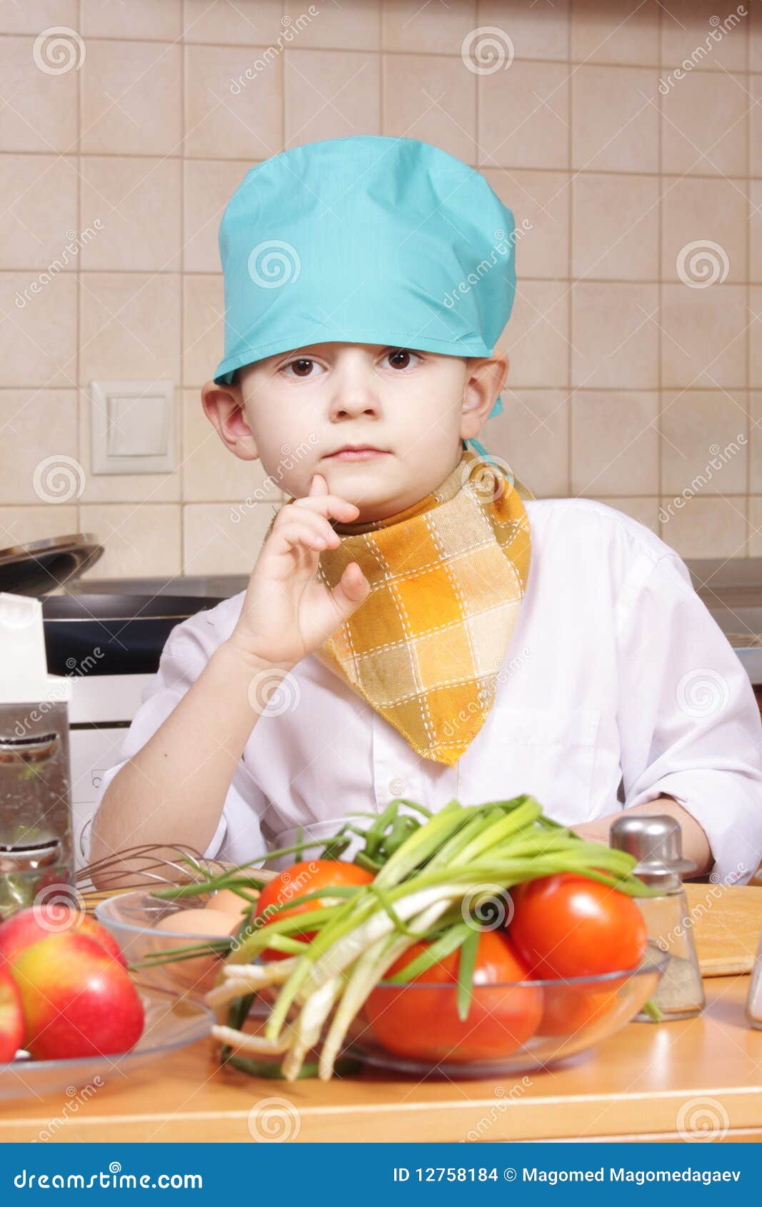 Thoughtful little cook stock photo. Image of tomatoes - 12758184
