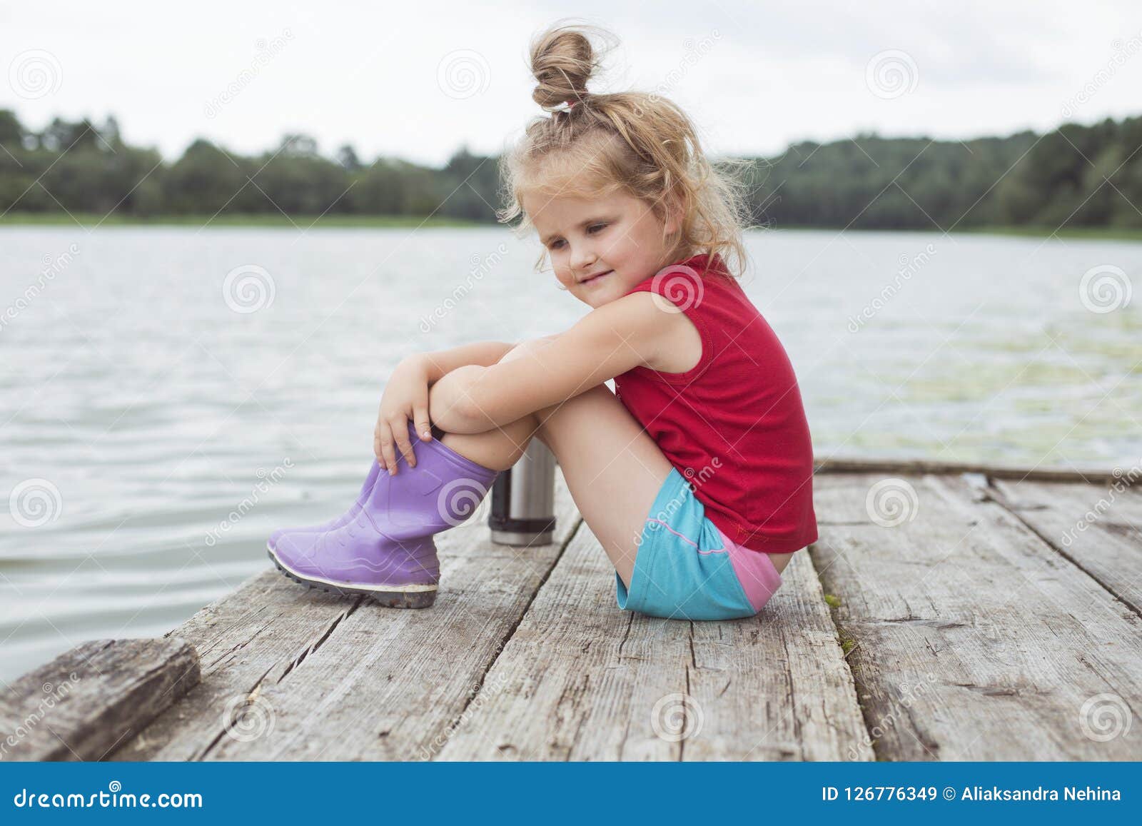 Thoughtful Little Girl Sitting on the Bridge Stock Image - Image of ...