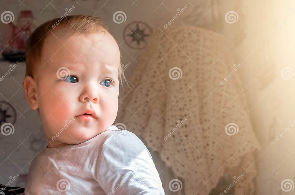 Thoughtful Look of a Small Child Looking Out the Window. Stock Image ...