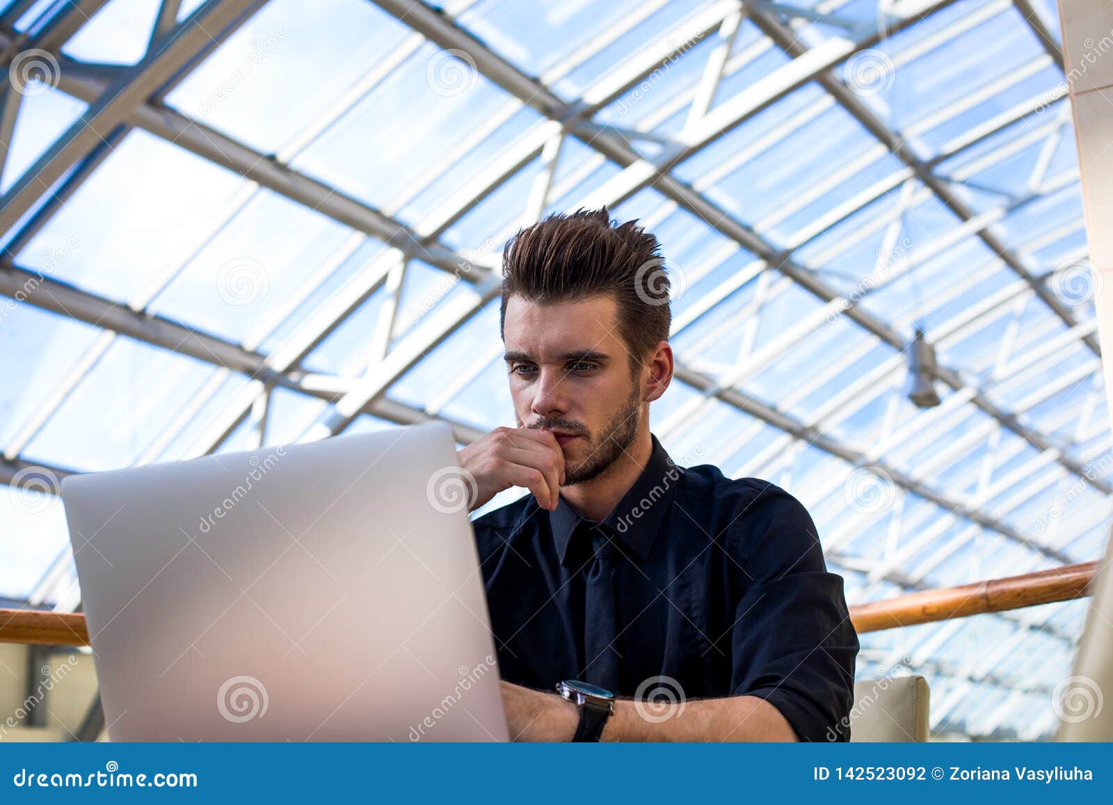 Thoughtful Male Developer Sites Thinking about New Ideas Stock Photo ...