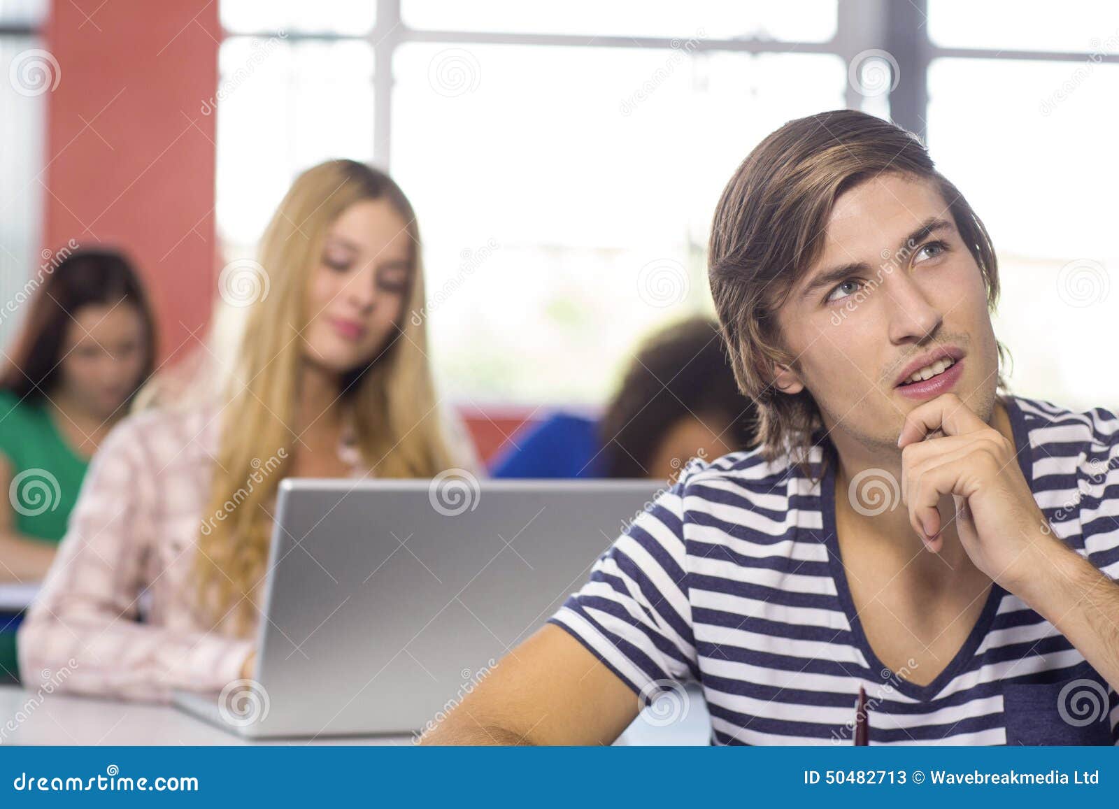 Thoughtful Male Student in Classroom Stock Image - Image of lesson ...