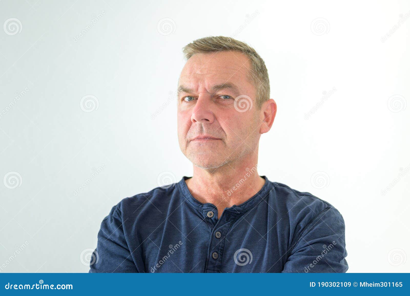 Thoughtful Man Glancing Sideways at Camera Stock Image - Image of shirt ...