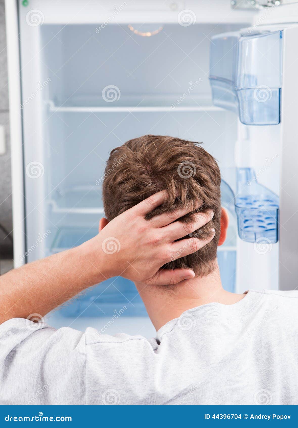 Thoughtful Man Looking in Empty Refrigerator Stock Photo - Image of ...