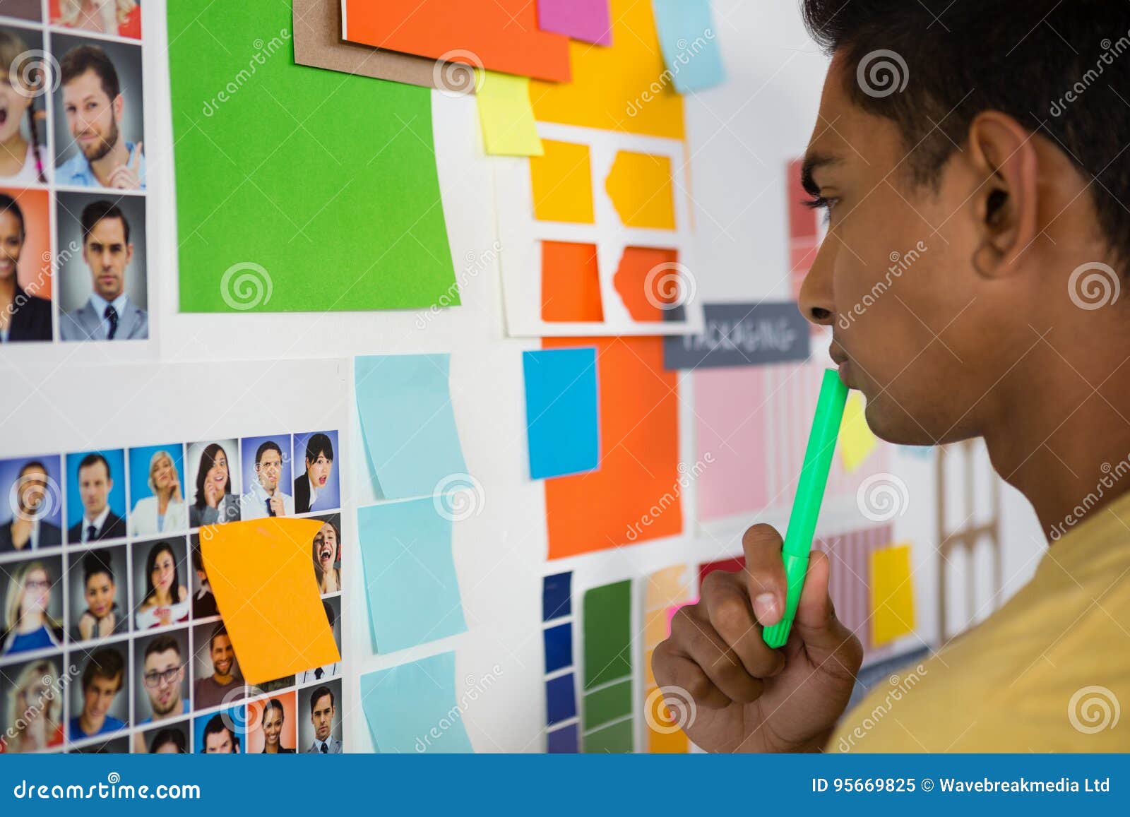 Thoughtful Man Looking at Sticky Notes in Office Stock Image - Image of ...