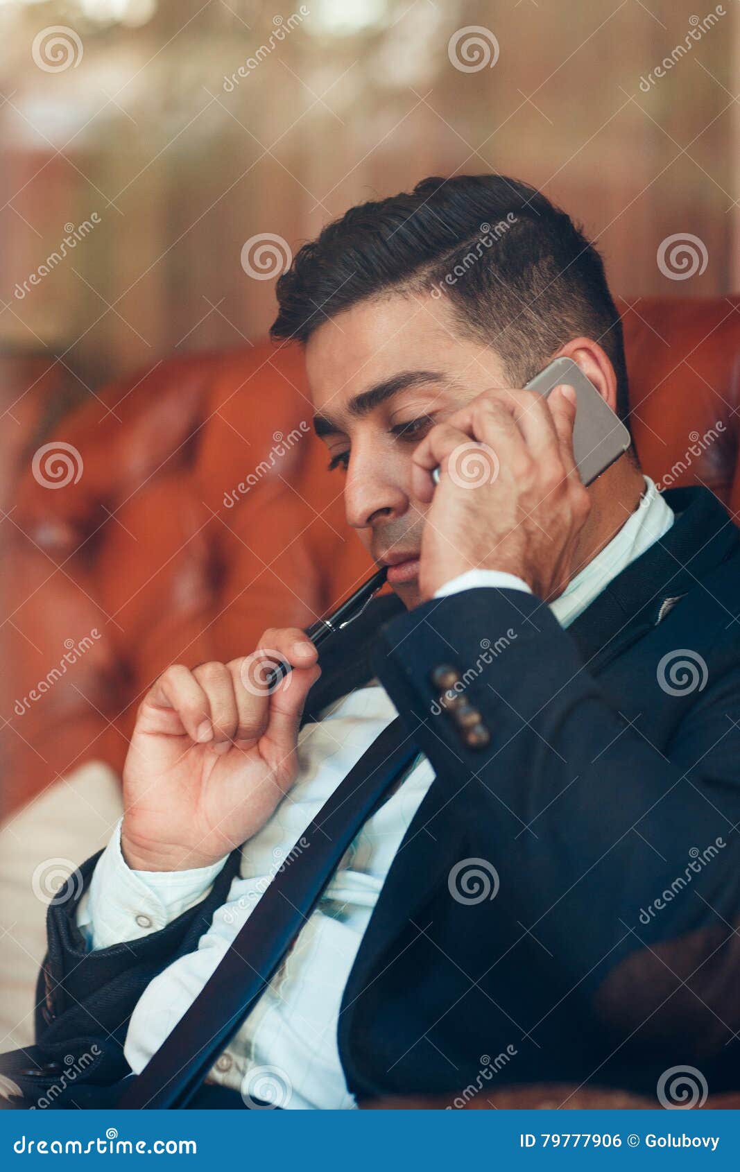 Thoughtful Man Negotiating on the Phone Stock Photo - Image of ...