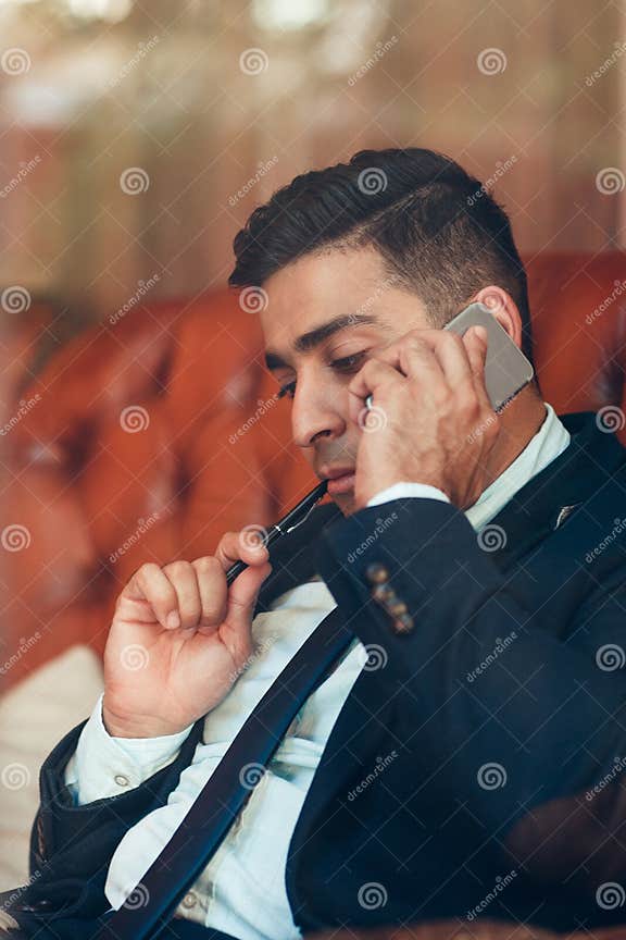 Thoughtful Man Negotiating on the Phone Stock Photo - Image of ...