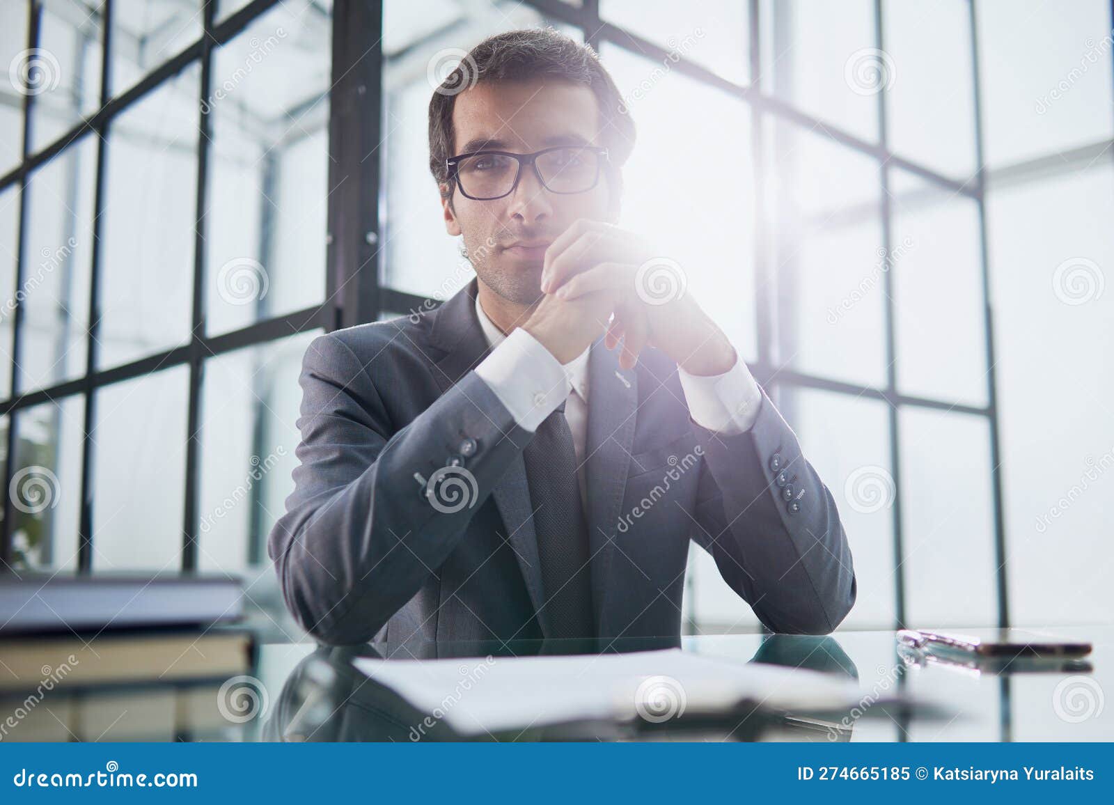 Thoughtful Man Sitting at the Table Thinking about Solving a Problem ...