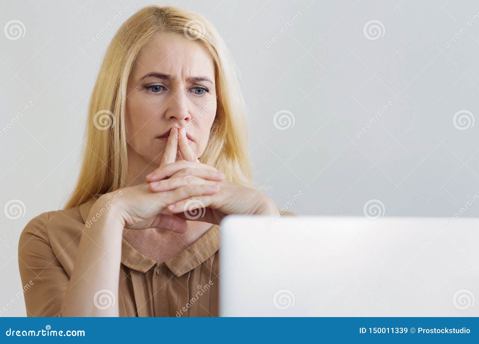 Thoughtful Mature Woman Thinking Of Problem Solution Stock Image