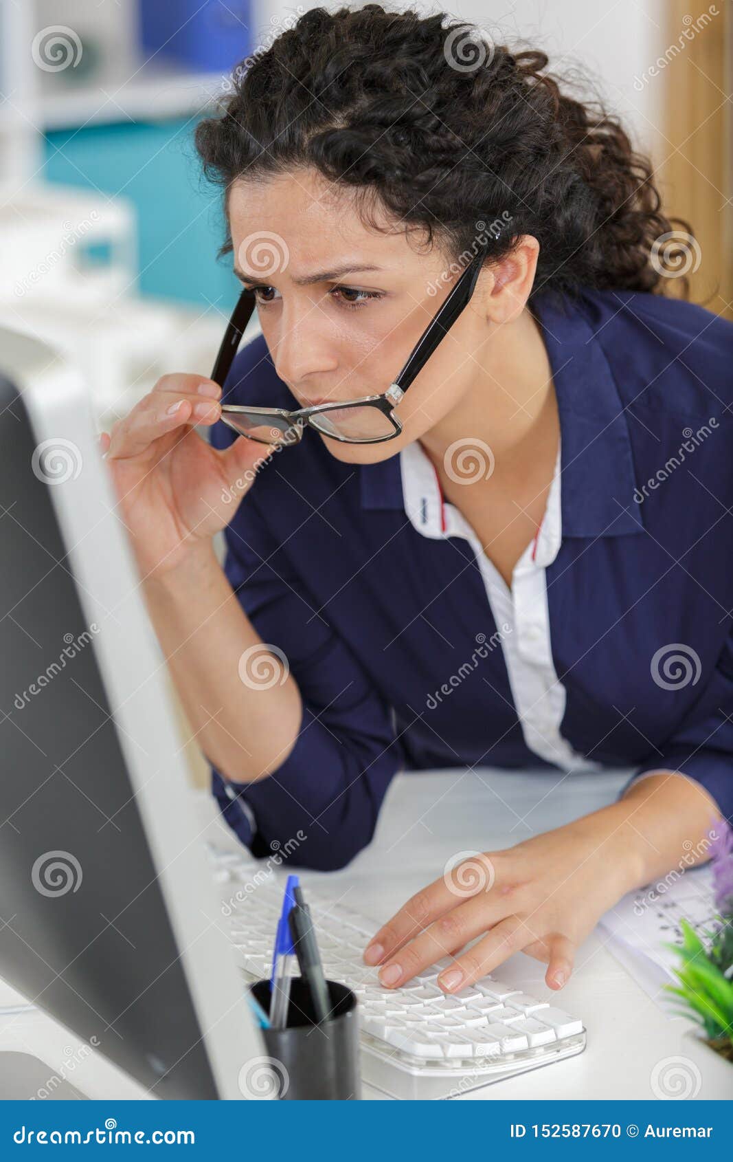 Thoughtful Middle-aged Female Engineer Looking at Screen Stock Photo ...