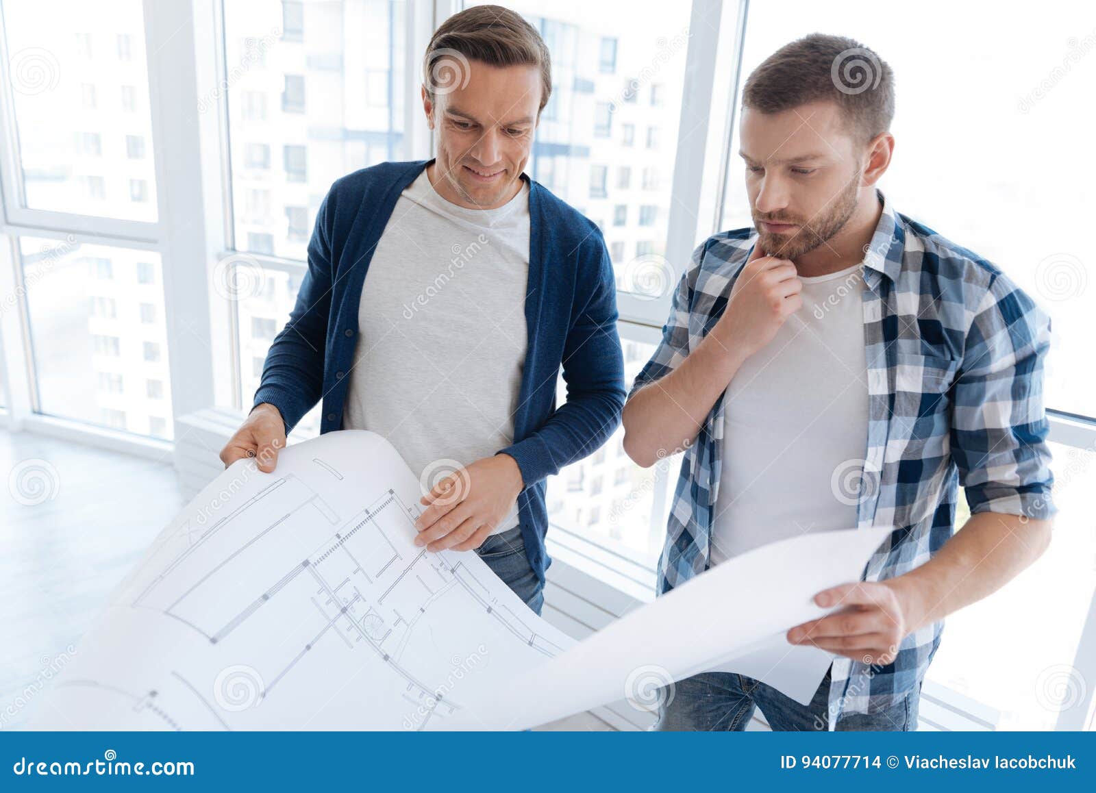 Thoughtful Nice Men Looking at the Engineering Drawing Stock Photo ...