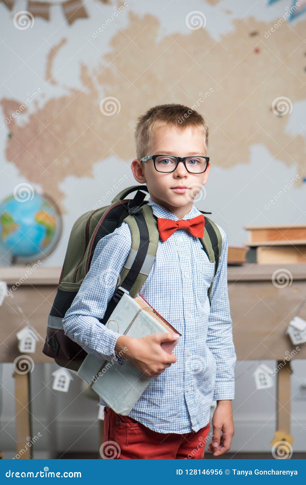 A Thoughtful Schoolboy Sits at a Desk with Books Stock Photo - Image of ... A Thoughtful Schoolboy Sits at a Desk with Books Stock Photo - Image of ...