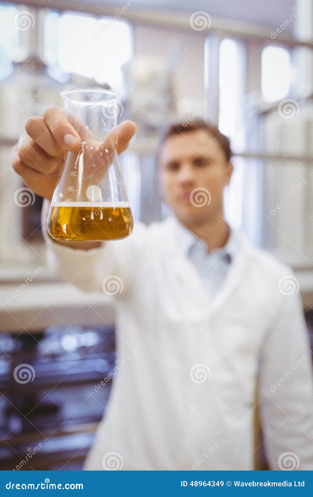 Thoughtful Scientist Holding a Beaker Stock Image - Image of indoors ...