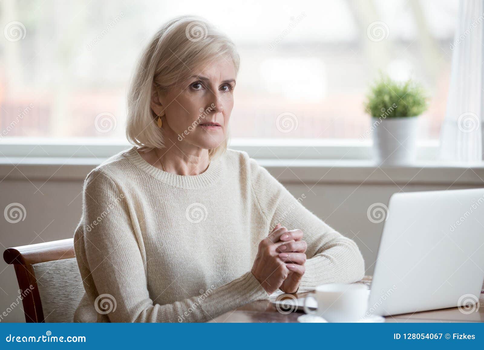 Thoughtful Serious Mature Woman Thinking Of Problem Solution Nea