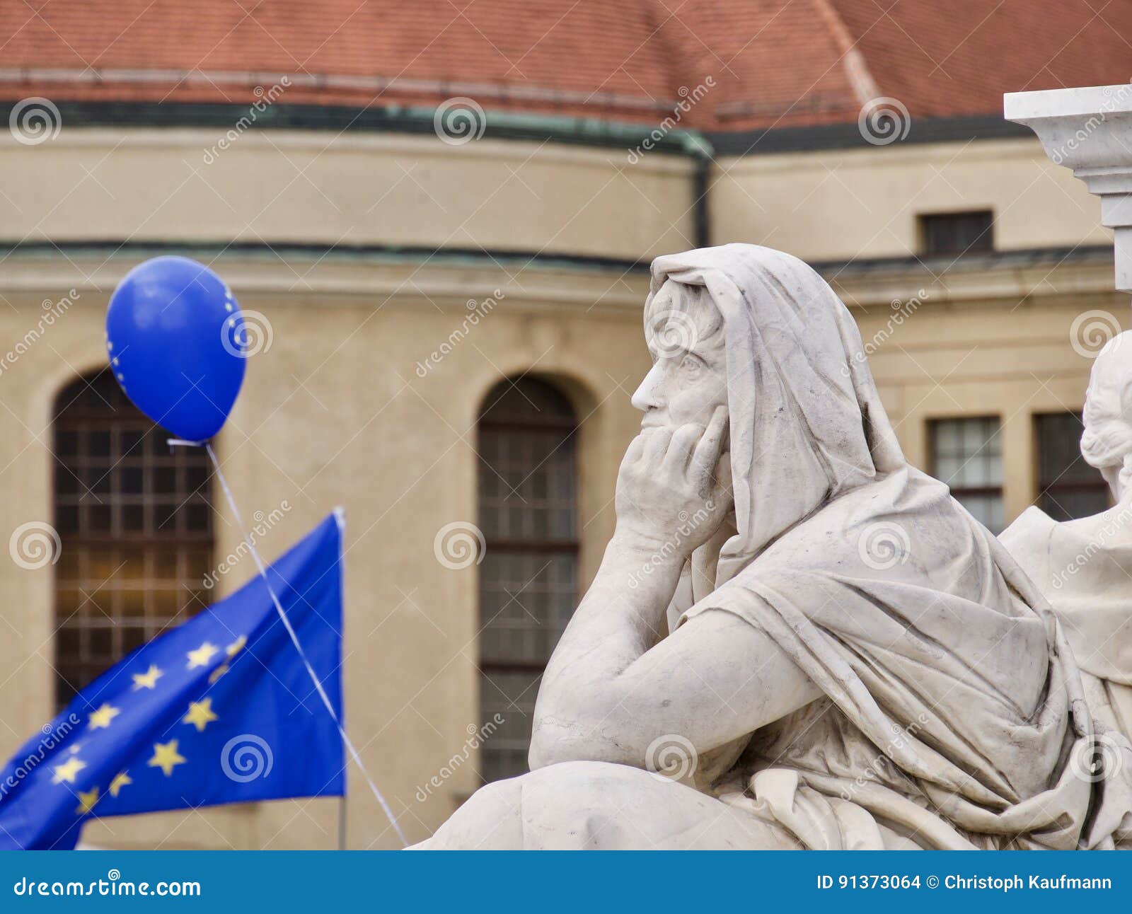 Thoughtful Statue and EU Symbols Stock Photo - Image of statue ...